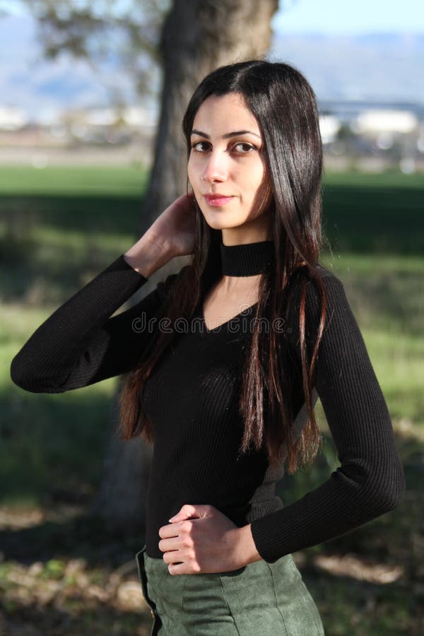 Middle Eastern Girl in a Park Stock Photo - Image of skirt, beautiful ...