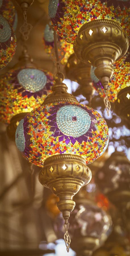 Middle Eastern Lambas of Different Colors and Sizes are Hanging in the ...