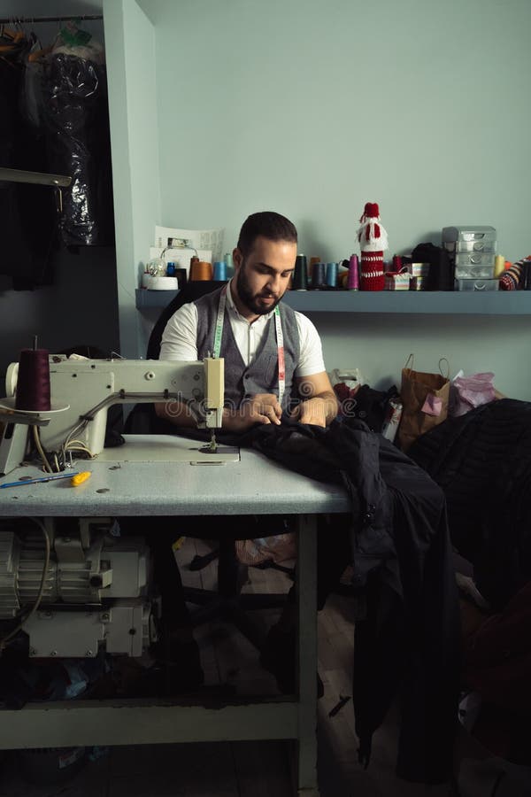 Man sewing stock image. Image of dark, cloth, fashion - 264446707