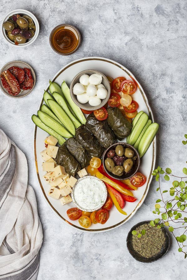 Middle Eastern Meze Platter with Vegetables, Crowd and Tzatziki Sauce ...