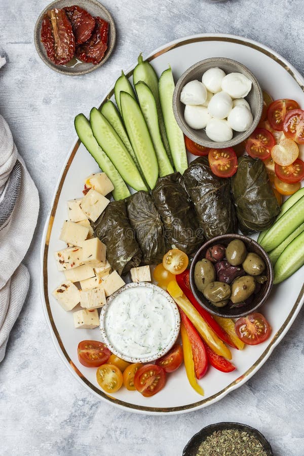 Middle Eastern Meze Platter with Vegetables, Crowd and Tzatziki Sauce ...