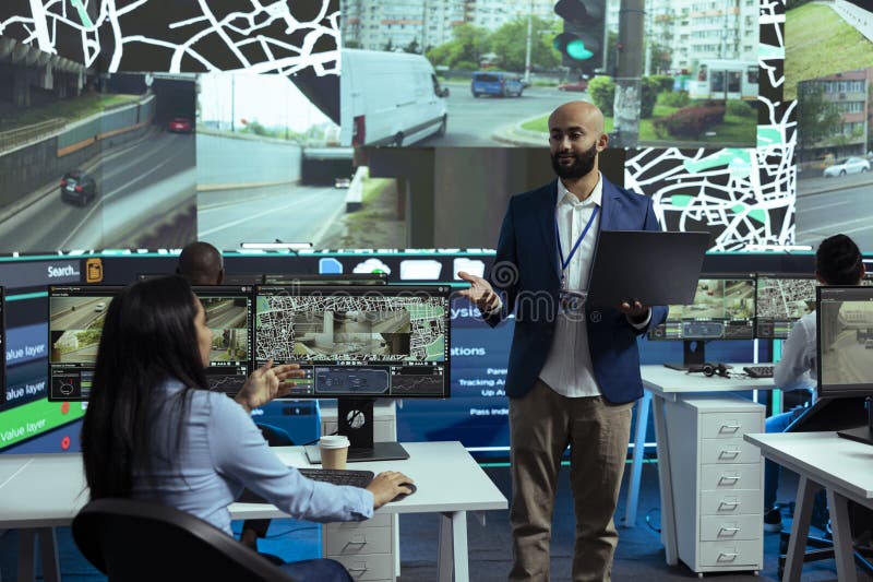 Middle Eastern Supervisor Oversees Order Tracking Activity in Control ...