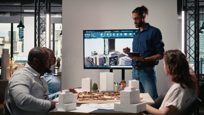 Middle Eastern Urban Developer Presenting Blueprints Master Plan To ...