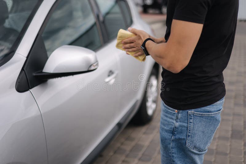 Middle Selection on Man Hold Yellow Rug for Car Cleaning Stock Image ...