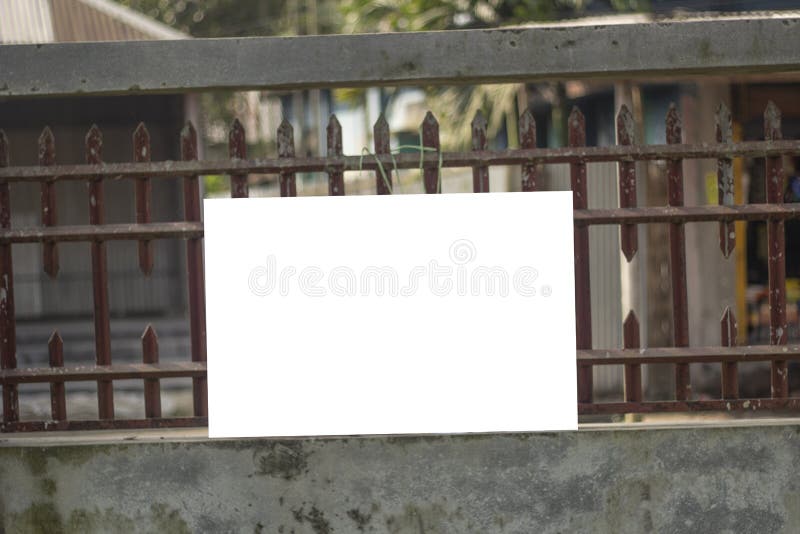 In the Middle of the Two Walls Hangs a Whiteboard with an Iron Grill ...