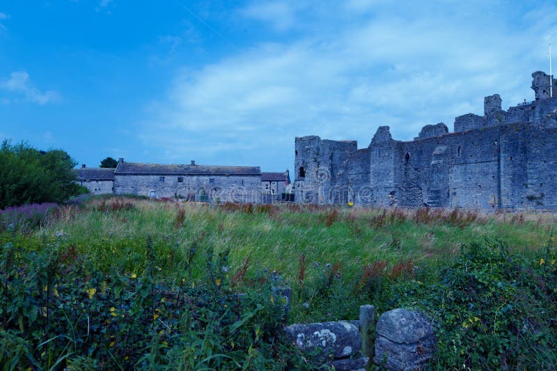 Middleham Castle at dusk. stock photo. Image of rock - 330168916
