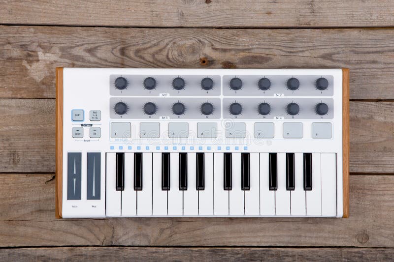 Close Up of MIDI Controller Volume Fader, Knob and Keys. Stock Photo ...