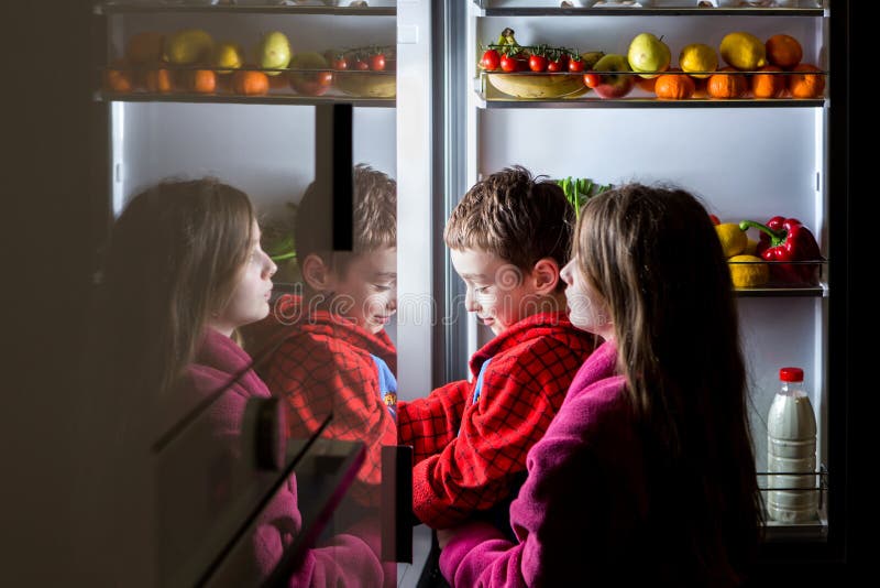 Midnight Snack, Looking into Fridge Stock Photo - Image of diet, little ...