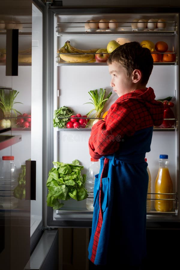 Midnight Snack, Looking into Fridge Stock Photo - Image of looking ...