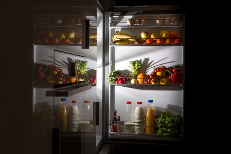 Midnight Snack, Looking into Fridge Stock Image - Image of freezer ...
