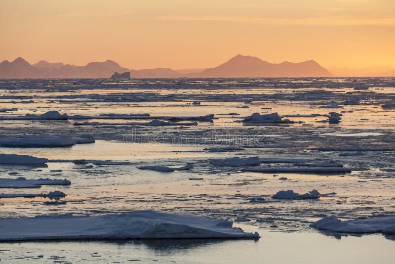Midnight Sun - Sea Ice - Greenland Stock Photo - Image of scenery ...
