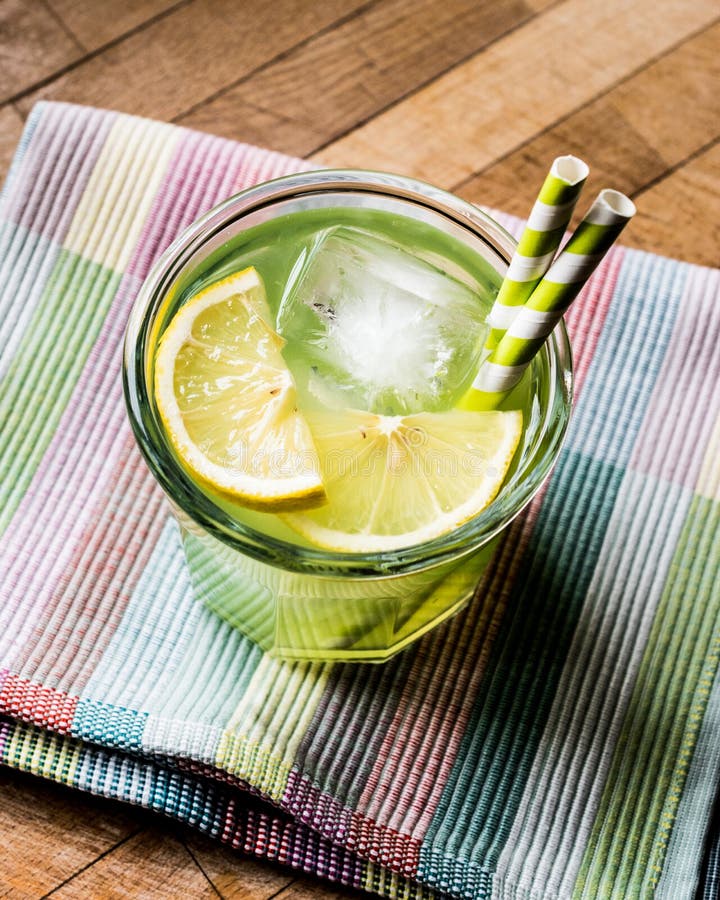 Midori Sour Cocktail with Ice and Lemon. Stock Photo - Image of juice ...