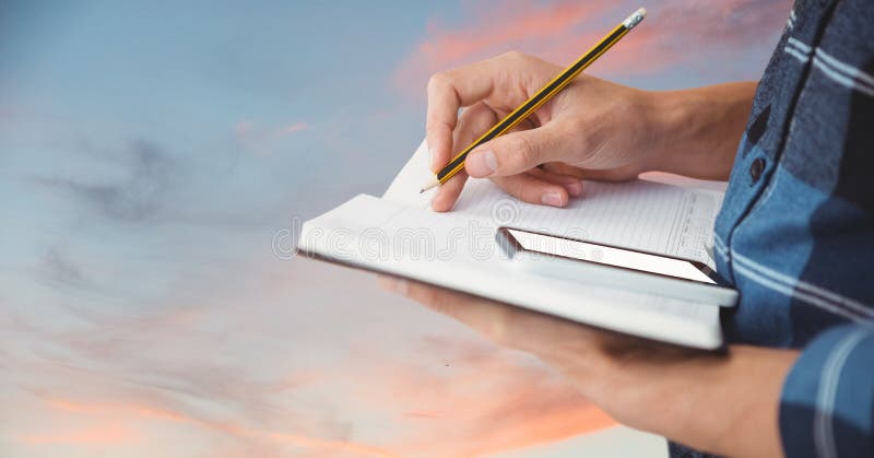 Midsection of Businessman with Mobile Phone Writing Notes in Book Stock ...