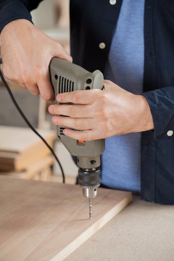 Midsection of Carpenter Drilling Wood Stock Photo - Image of craftsman ...