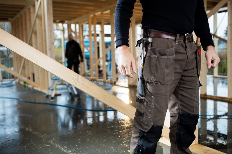 Midsection of Carpenter Standing at Site Stock Photo - Image of ...