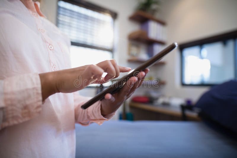 Doctor Using Mobile Phone in Hospital Stock Photo - Image of ...