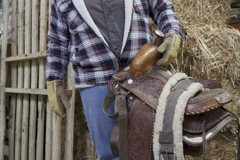 Midsection of a Mature Man Holding Horse Riding Tack Stock Image ...