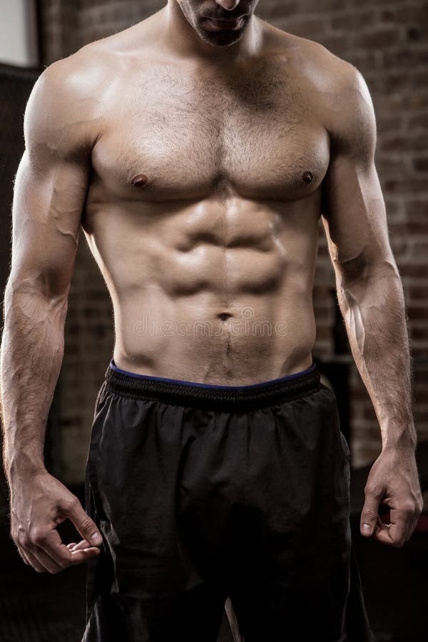Midsection of a Muscular Man Showing His Body Stock Photo - Image of ...