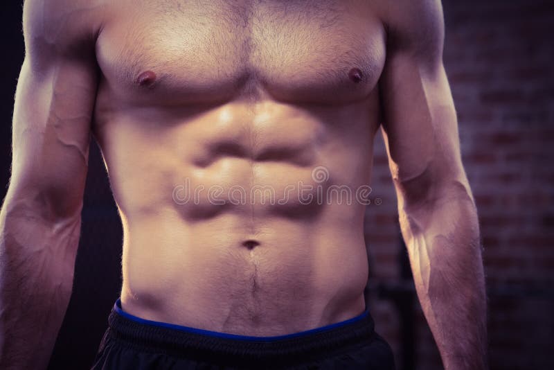 Mid Section Muscular Man Showing His Abs Stock Photos - Free & Royalty ...