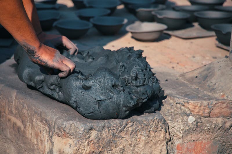 Midsection of Professional Potter Working with Clay on the Square in ...