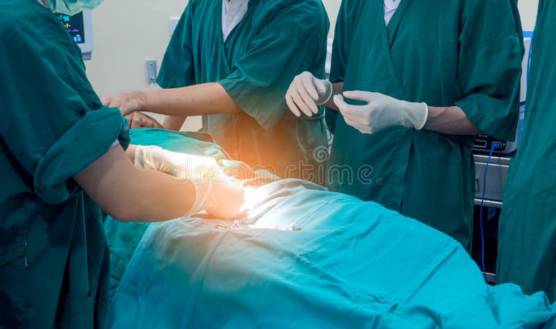 Midsection of Surgery Team Operating Medical Team Performing Surgical ...
