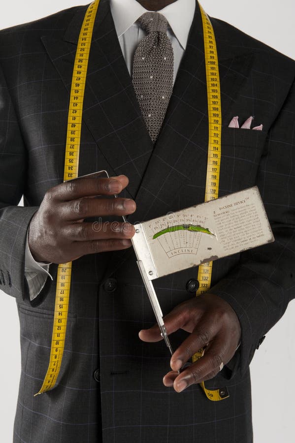 Man Getting Measured by a Tailor on a White Background Stock Photo ...