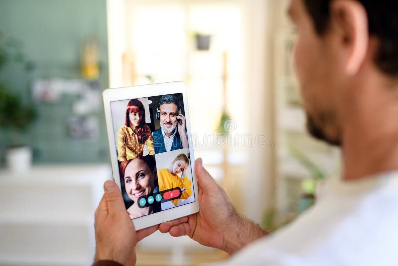 Unrecognizable Man Having Video Call on Tablet at Home. Stock Photo ...
