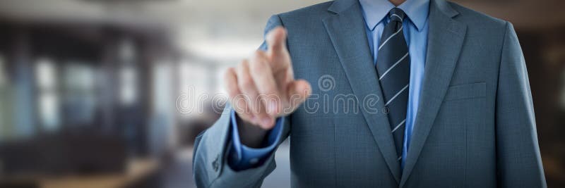 Midsection of Well Dressed Businessman Pointing Against Table and Empty ...