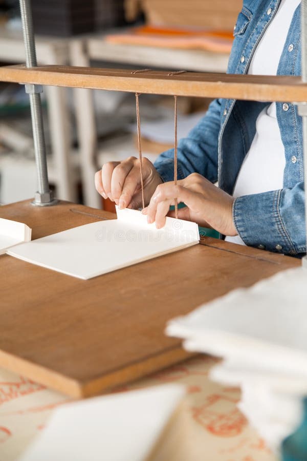 Midsection of Worker Binding Papers in Factory Stock Image - Image of ...