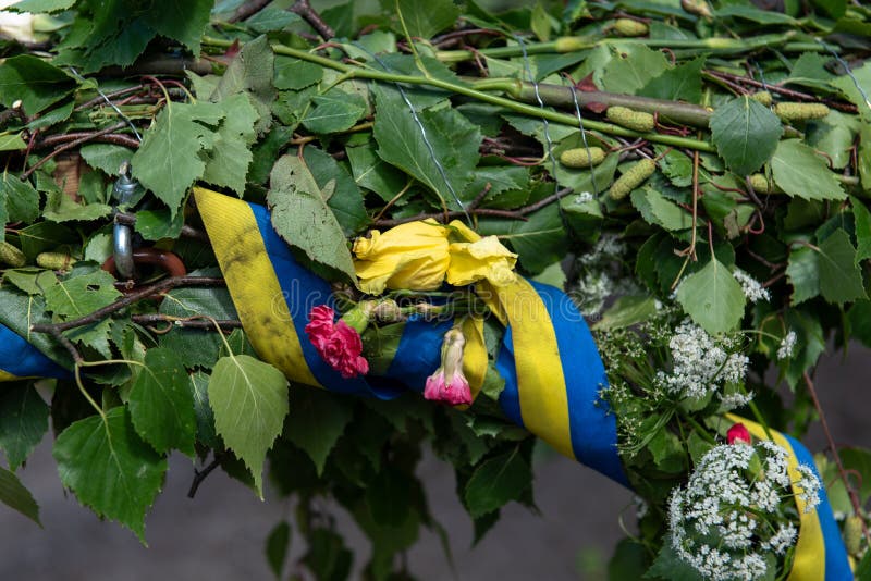 Midsummer Celebrations in Sweden. Flowers on the Swedish Midsummer Pole ...