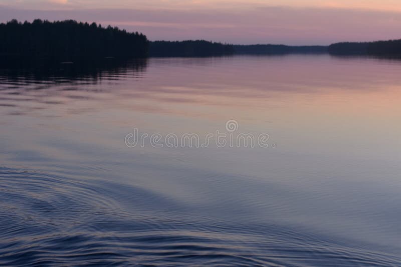Midsummer Sunset Reflection on a Lake Stock Image - Image of pink ...