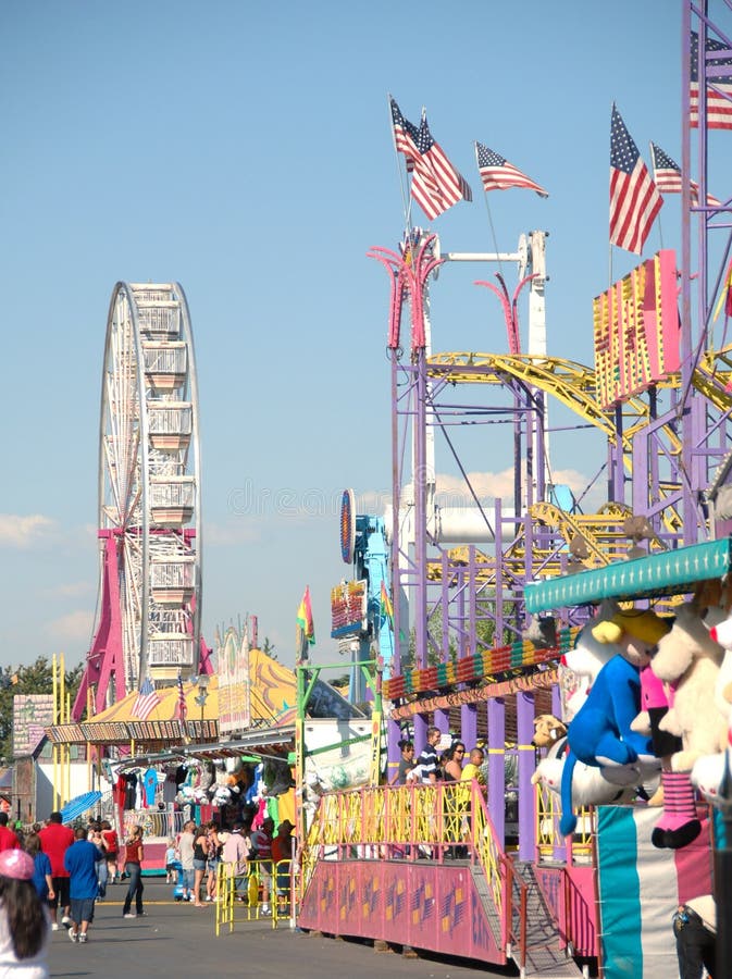The Midway at the County Fair Editorial Photo - Image of ferris, flag ...