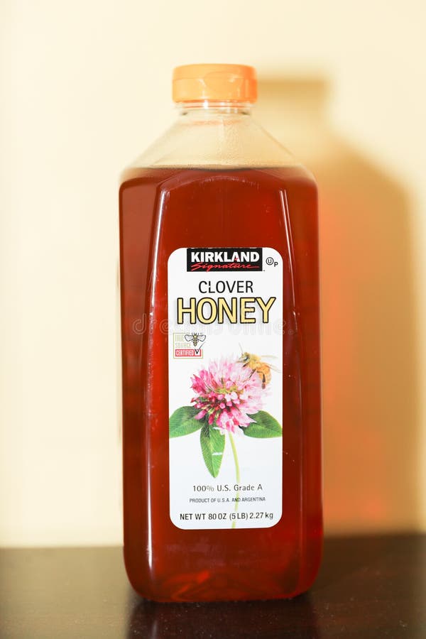 Miel Cru De Kirkland Dans Des Bouteilles Photo éditorial - Image du ...