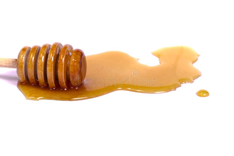 Miel dulce derramada foto de archivo. Imagen de blanco - 105952808