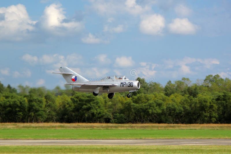Mig-15 UTI in low flight editorial photography. Image of historic ...