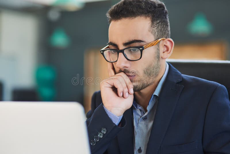 This Might Be a Bit of a Challenge. a Young Businessman Working on a ...