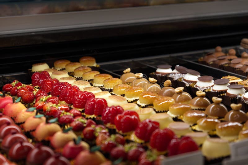 A Mignon High Pastry Showcase Stock Photo - Image of display, berry ...