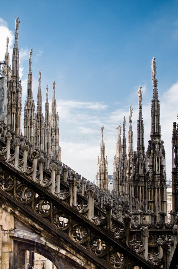 Milan Duomo statues rows stock image. Image of lombardy - 44120937