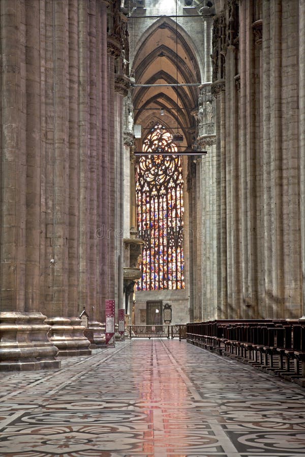 Milan - side nave of Dom stock image. Image of evening - 21517853