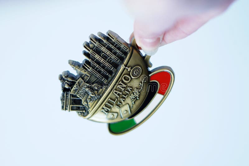 Milan Symbol in a Hand, Italy Stock Photo - Image of necklace, watch ...