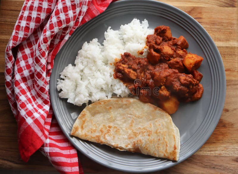 Mild Chicken Curry with Rice and Roti Stock Image - Image of paratha ...