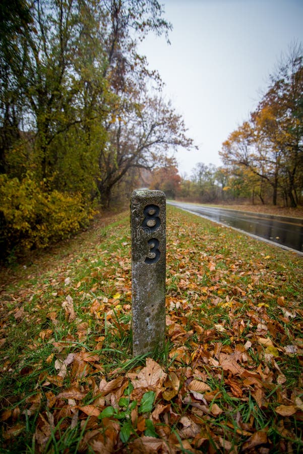 Mile Marker 83 stock photo. Image of foliage, post, orange - 63527200