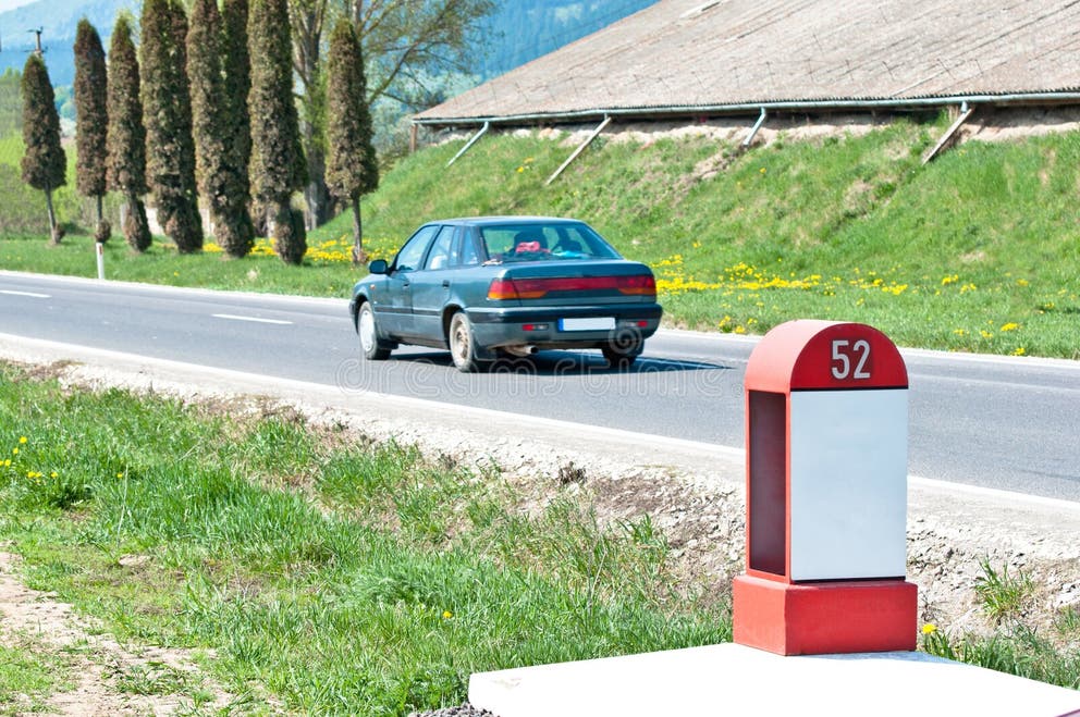 Milestone on a Countryside Road Stock Photo - Image of destination ...