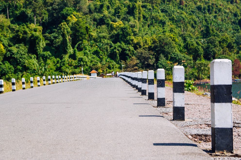 Milestone at the Roadside with Mountain Landscape Stock Image - Image ...