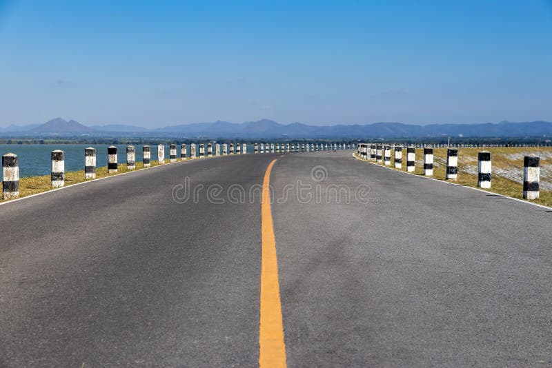 Milestones,black and White Milestones Roadside with Blue Sky ,lake ...