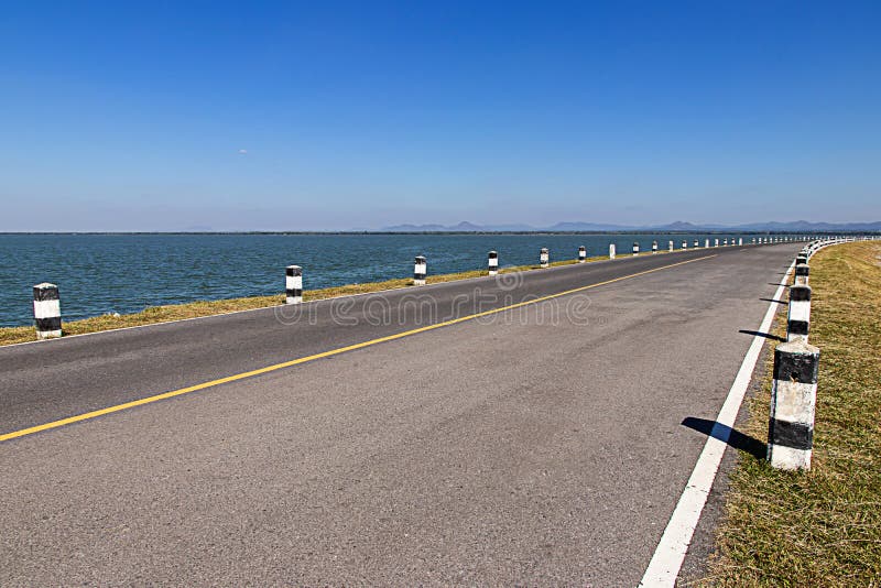 Milestones,black and White Milestones Roadside with Blue Sky ,lake ...