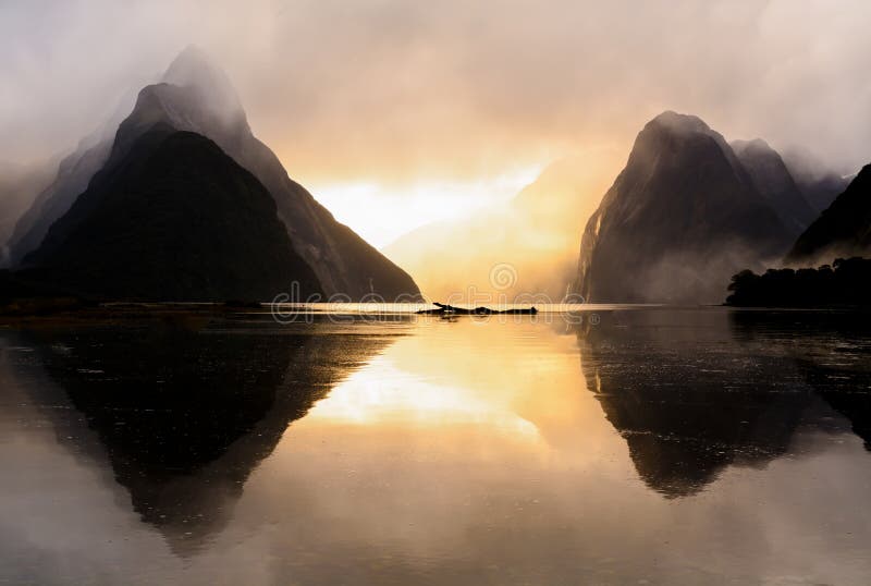 Milford Sound at sunset stock photo. Image of clouds - 94260480