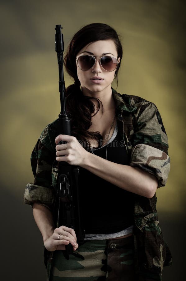 Militarized Young Woman with Assault Rifle Stock Photo - Image of ...