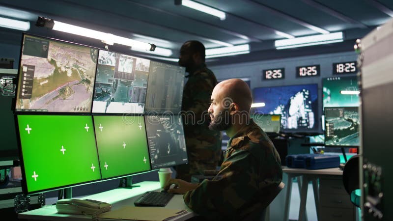 Intelligence Corps Expert Controlling Drones with Mockup Notebook Stock ...