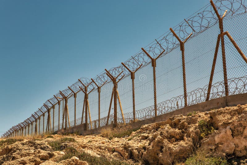 Military Base with Barbed Wire Fence Stock Image - Image of barbed ...